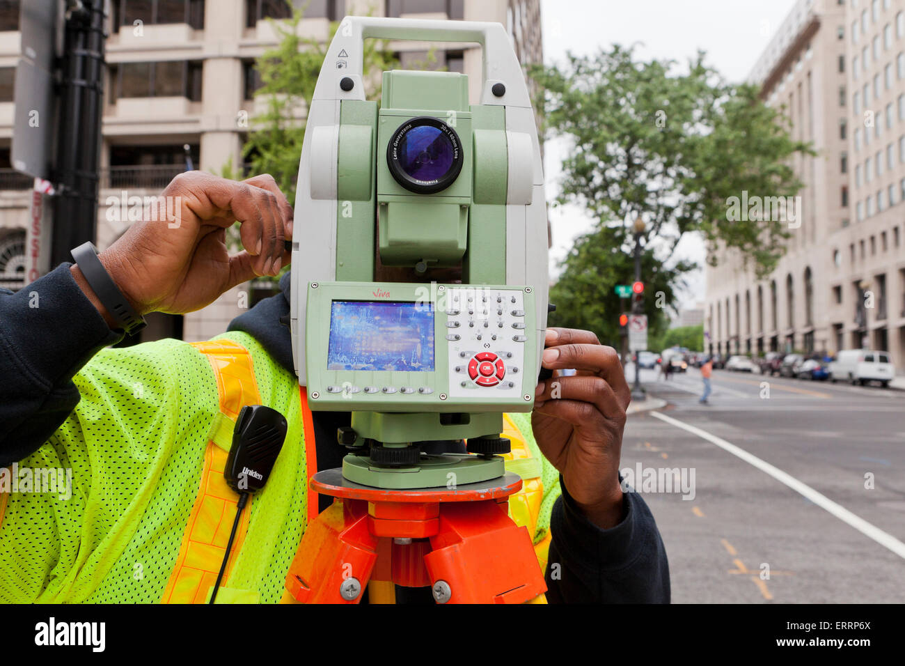 Surveyor using land survey station on tripod - USA Stock Photo - Alamy