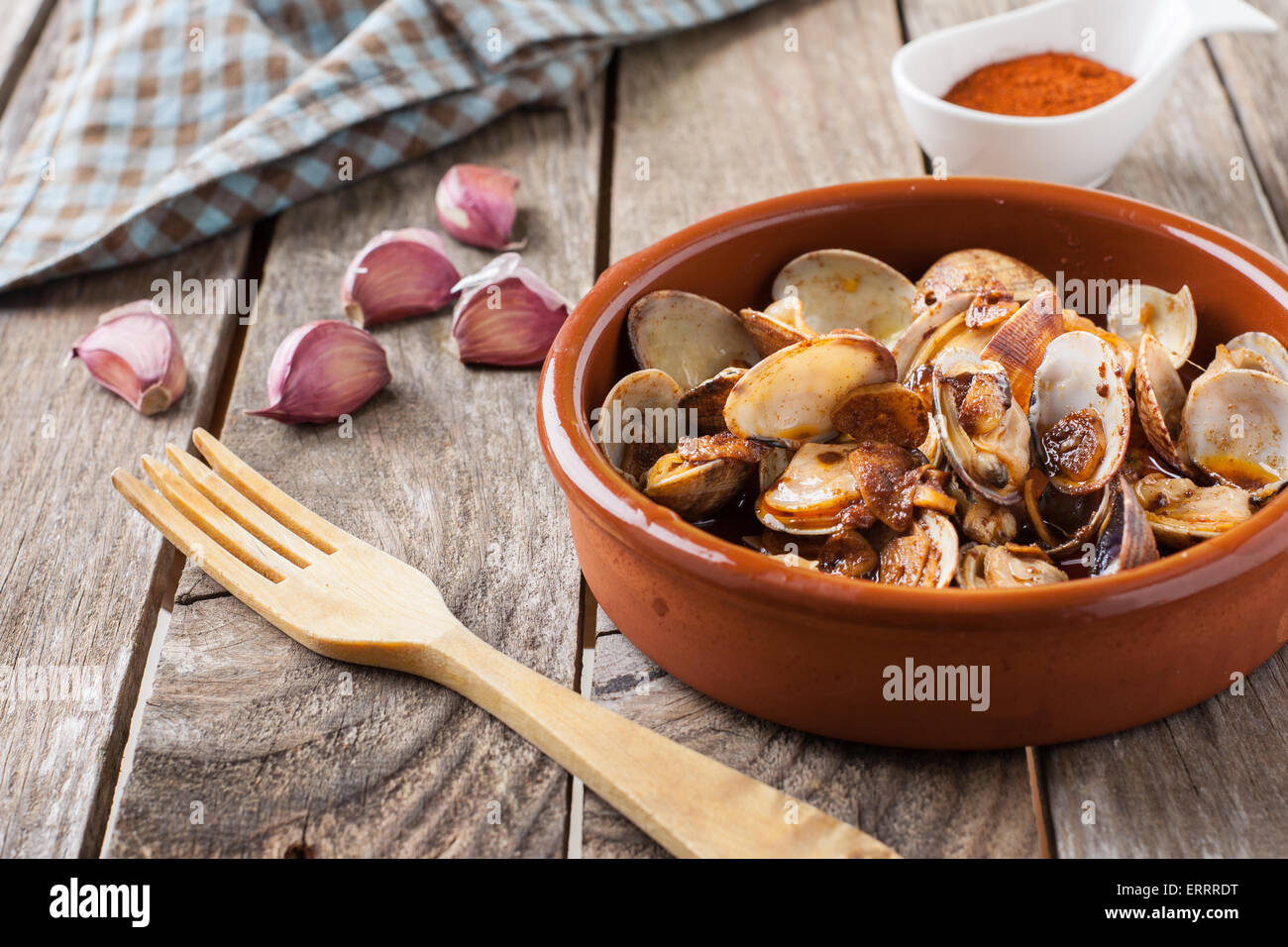 clams with garlic at paprika spanish seafood style Stock Photo - Alamy