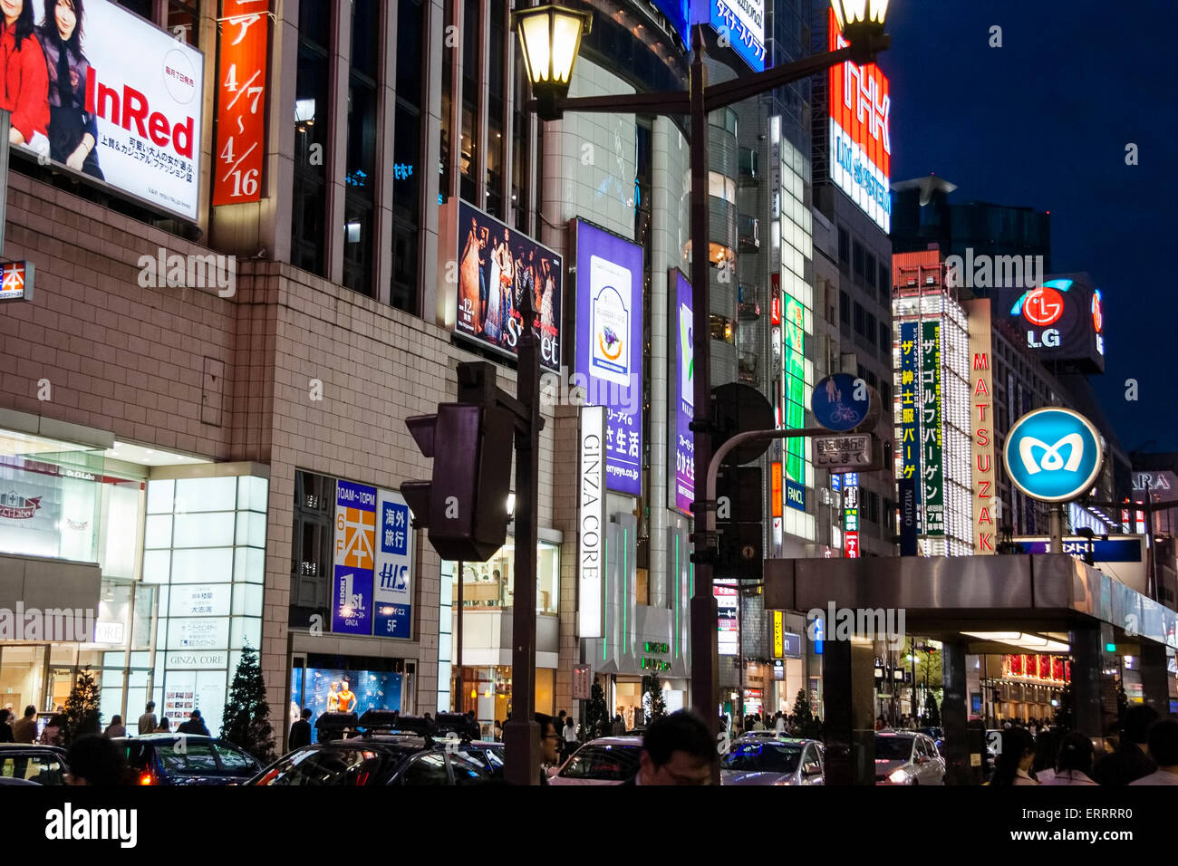 The Ginza at night. General view along street, buildings and illuminated signs by the Ginza Core ...
