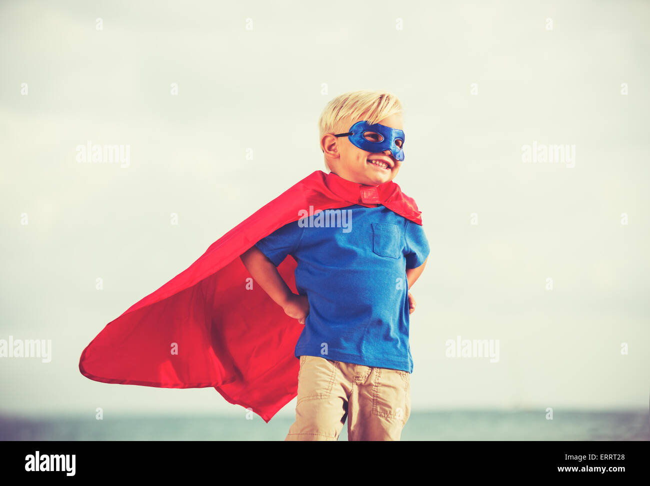 Superhero Kid, Young Happy Boy Playing Stock Photo - Alamy