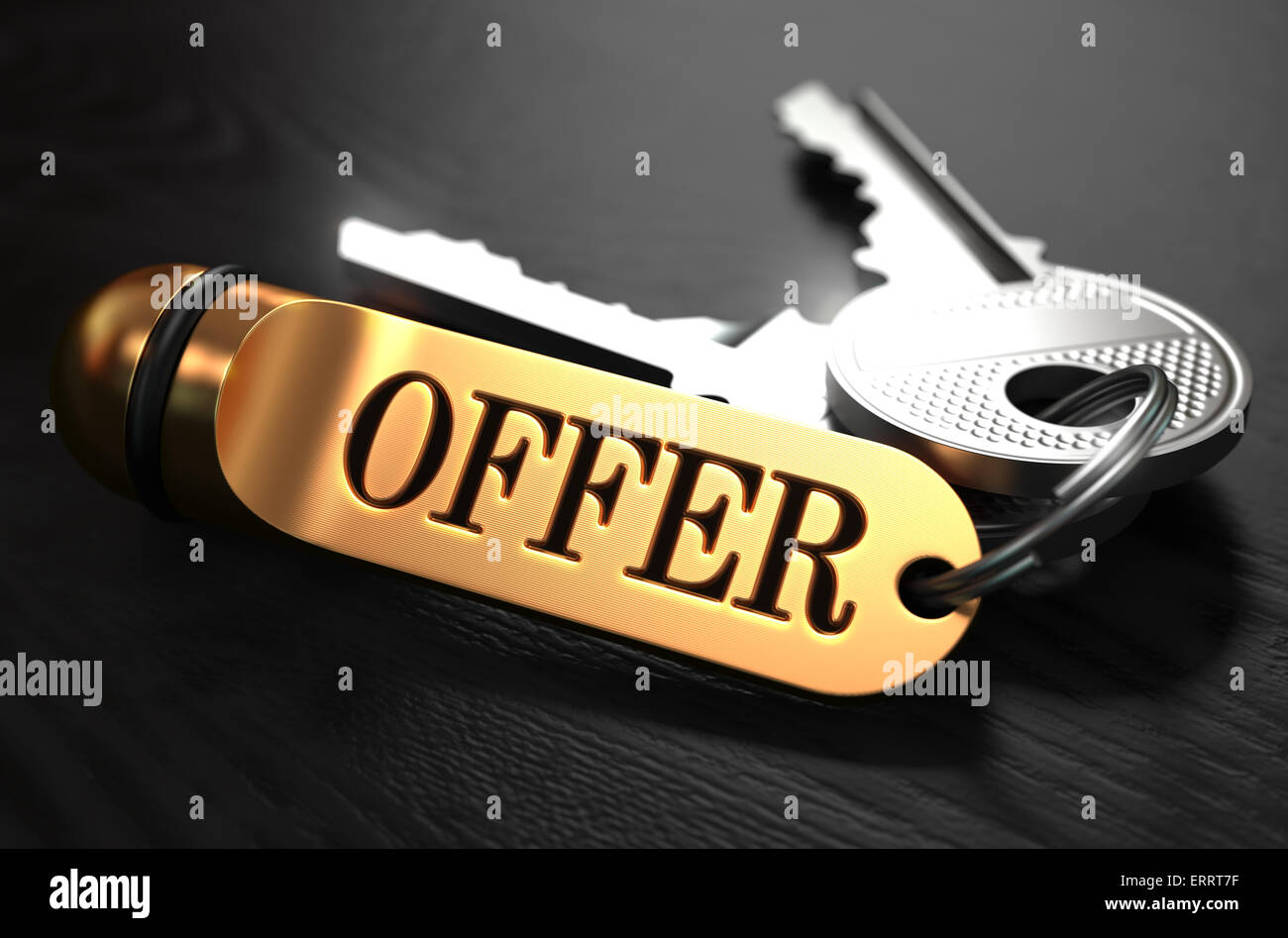 Keys with Word Offer on Golden Label Stock Photo - Alamy