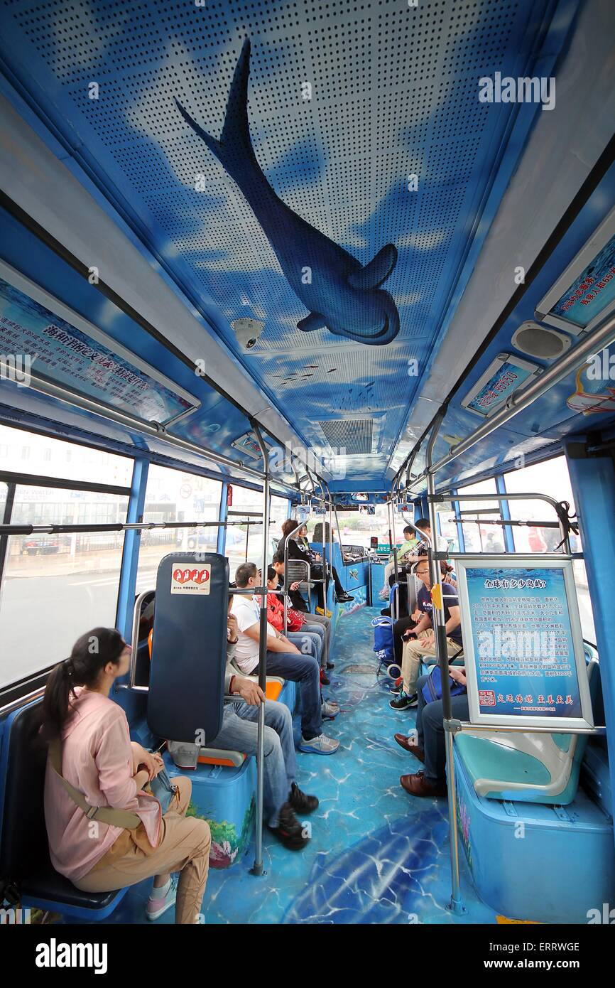 Qingdao, China's Shandong Province. 8th June, 2015. People take a bus ...