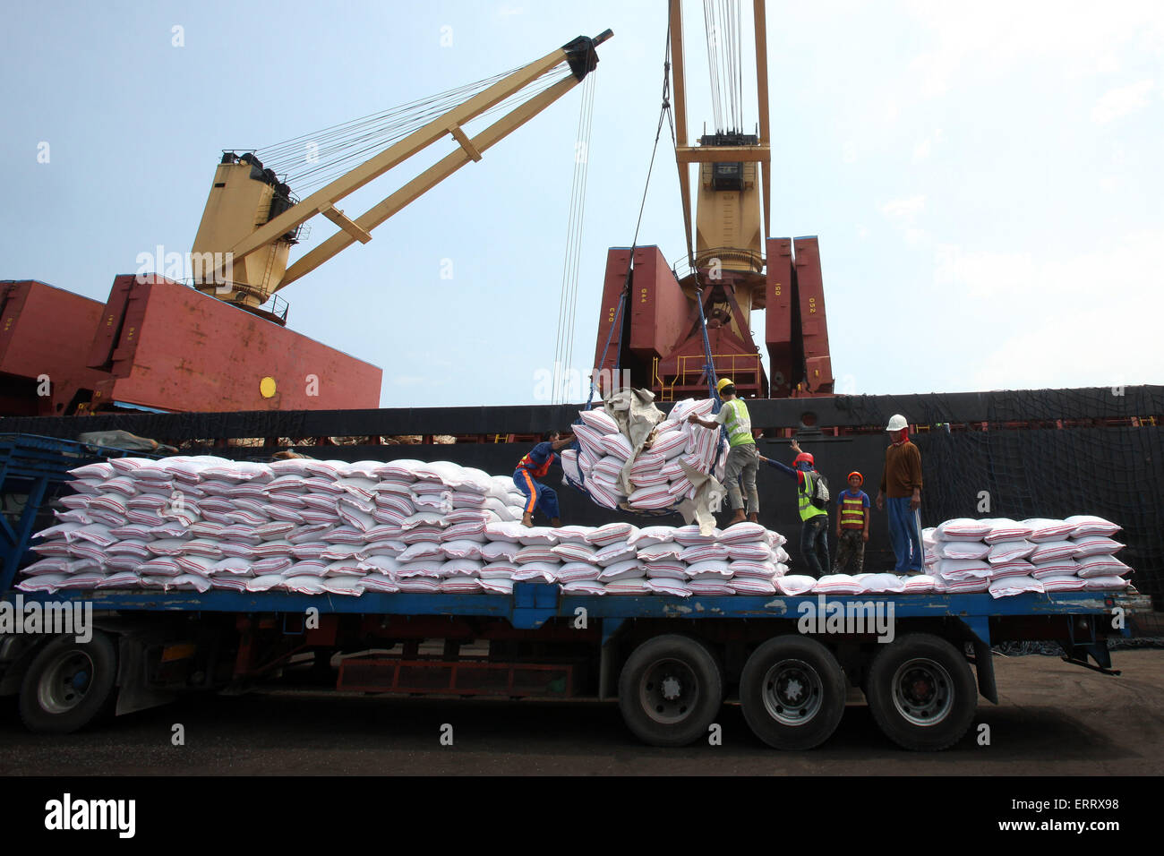 Navotas City, Philippines. 8th June, 2015. Workers unload sacks of ...