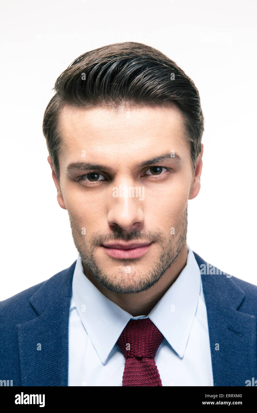 Portrait of a confident young businessman isolated on a white ...