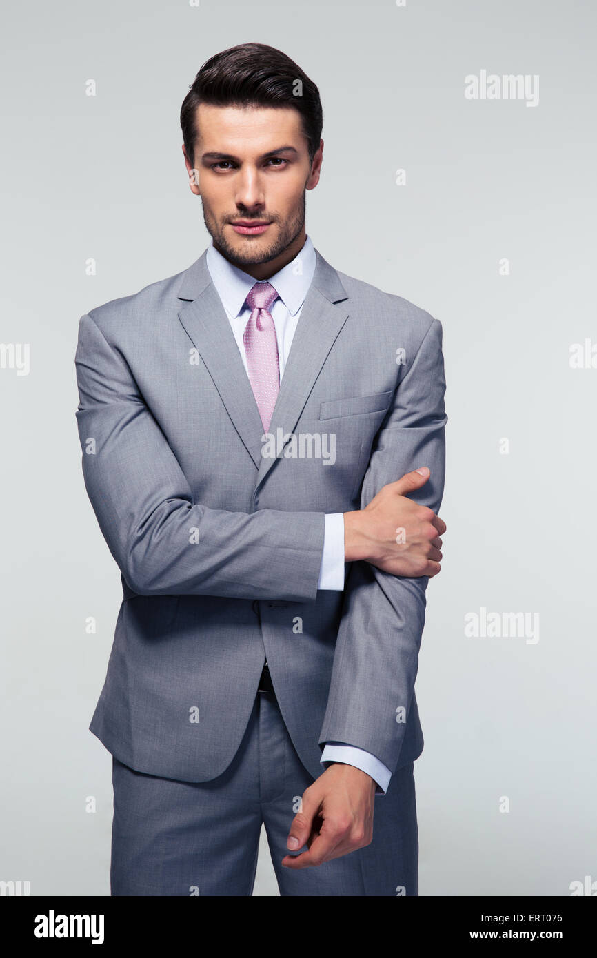 Portrait serious office worker standing hi-res stock photography and ...