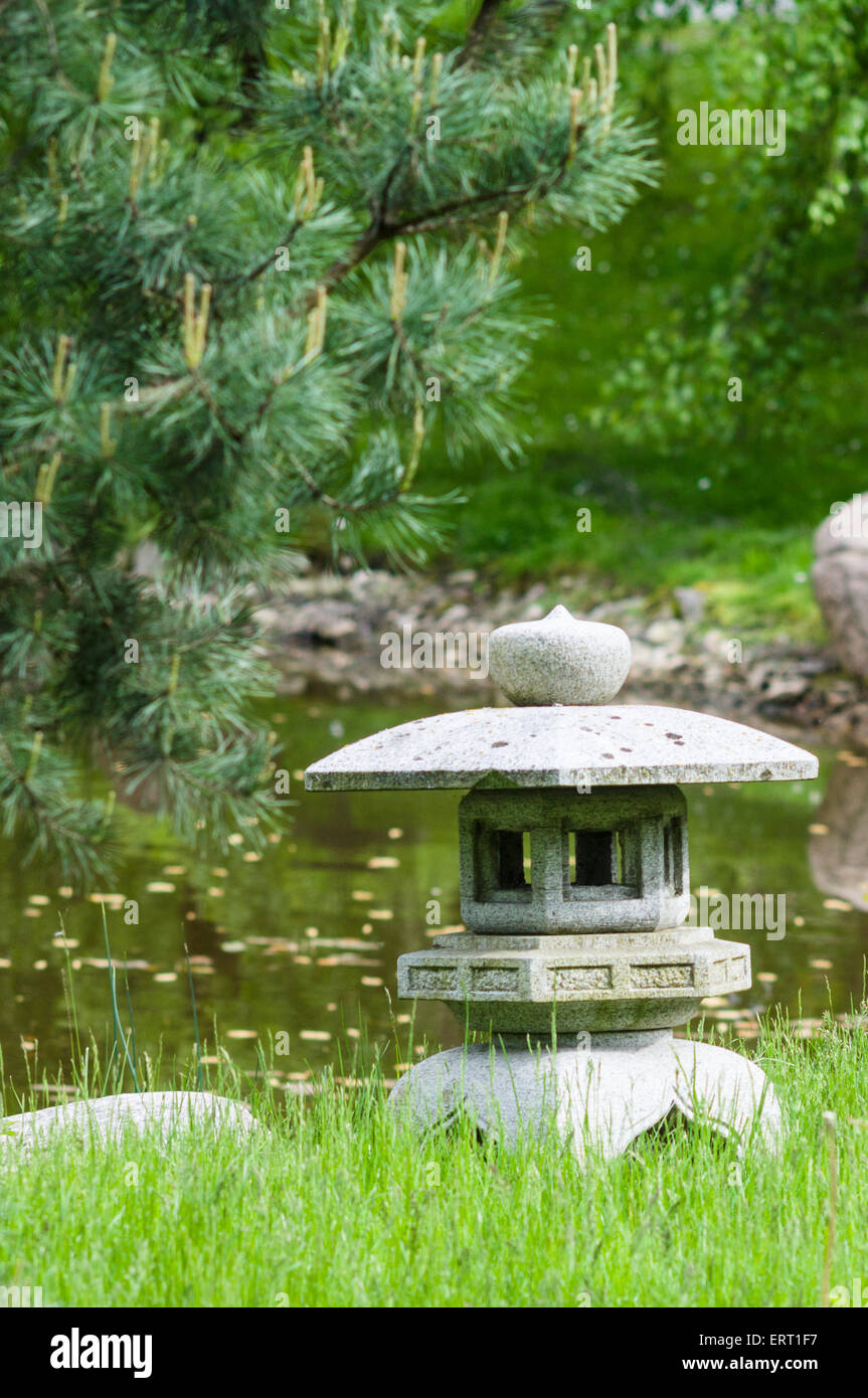 Stone lantern in Japanese garden Stock Photo - Alamy