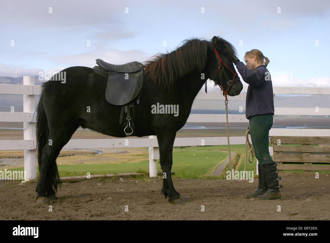 Girl cuddling pony hi-res stock photography and images - Alamy