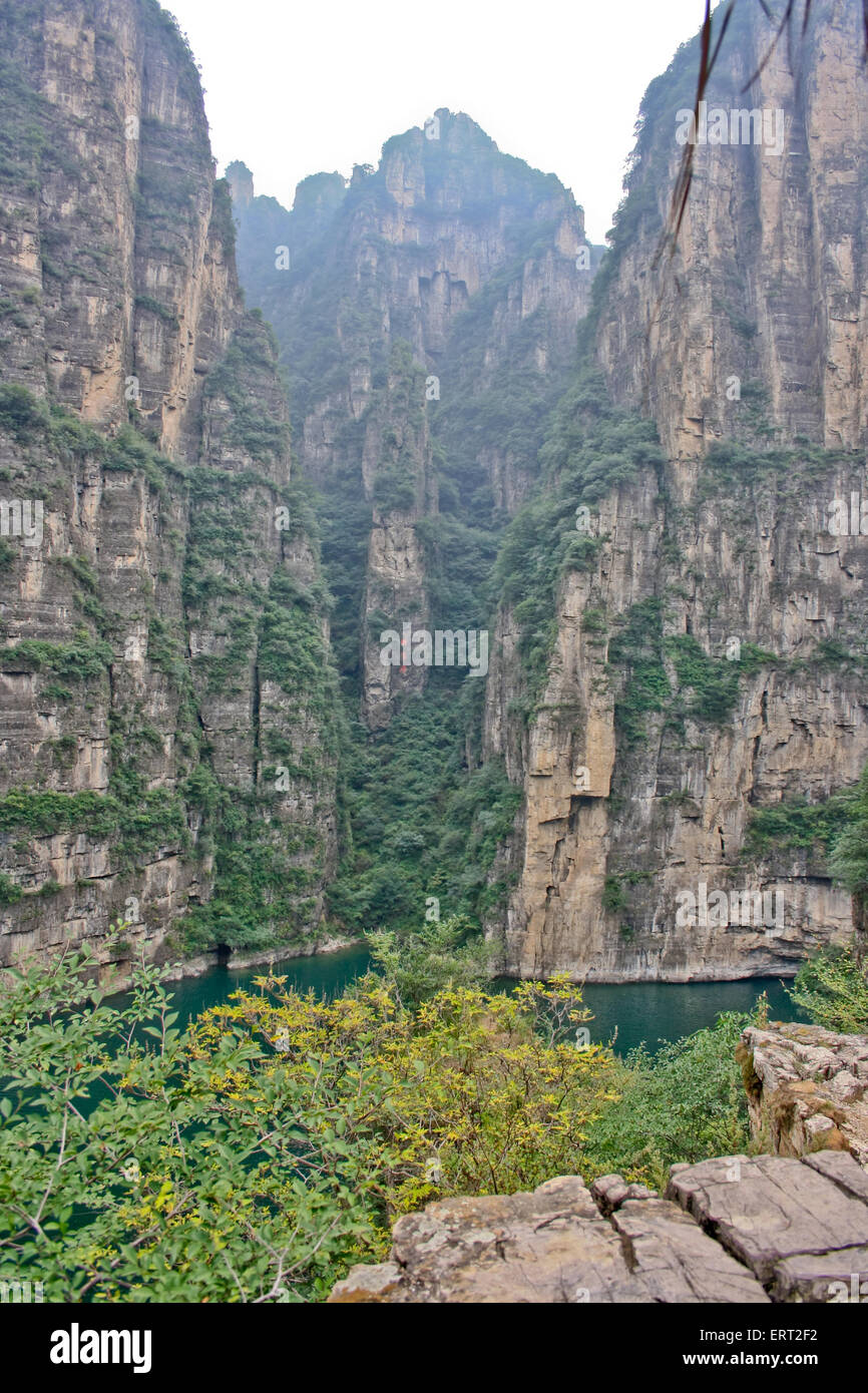 Steep high cliffs and the river at the bottom of the gorge Stock Photo ...