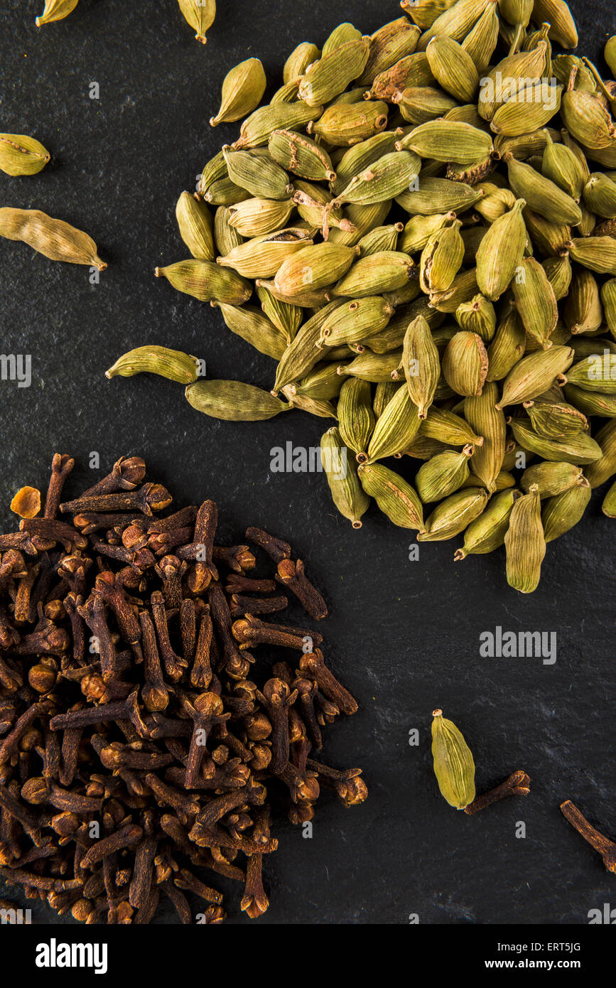 Cardamom and cloves spices Stock Photo - Alamy