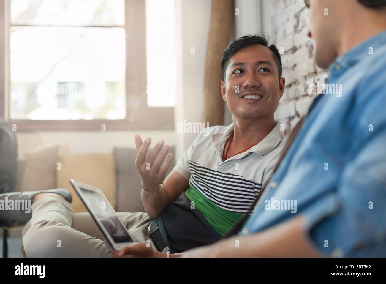 Two Men Using Laptop at Cafe, Multiethnic Friends Guys Sitting Stock ...