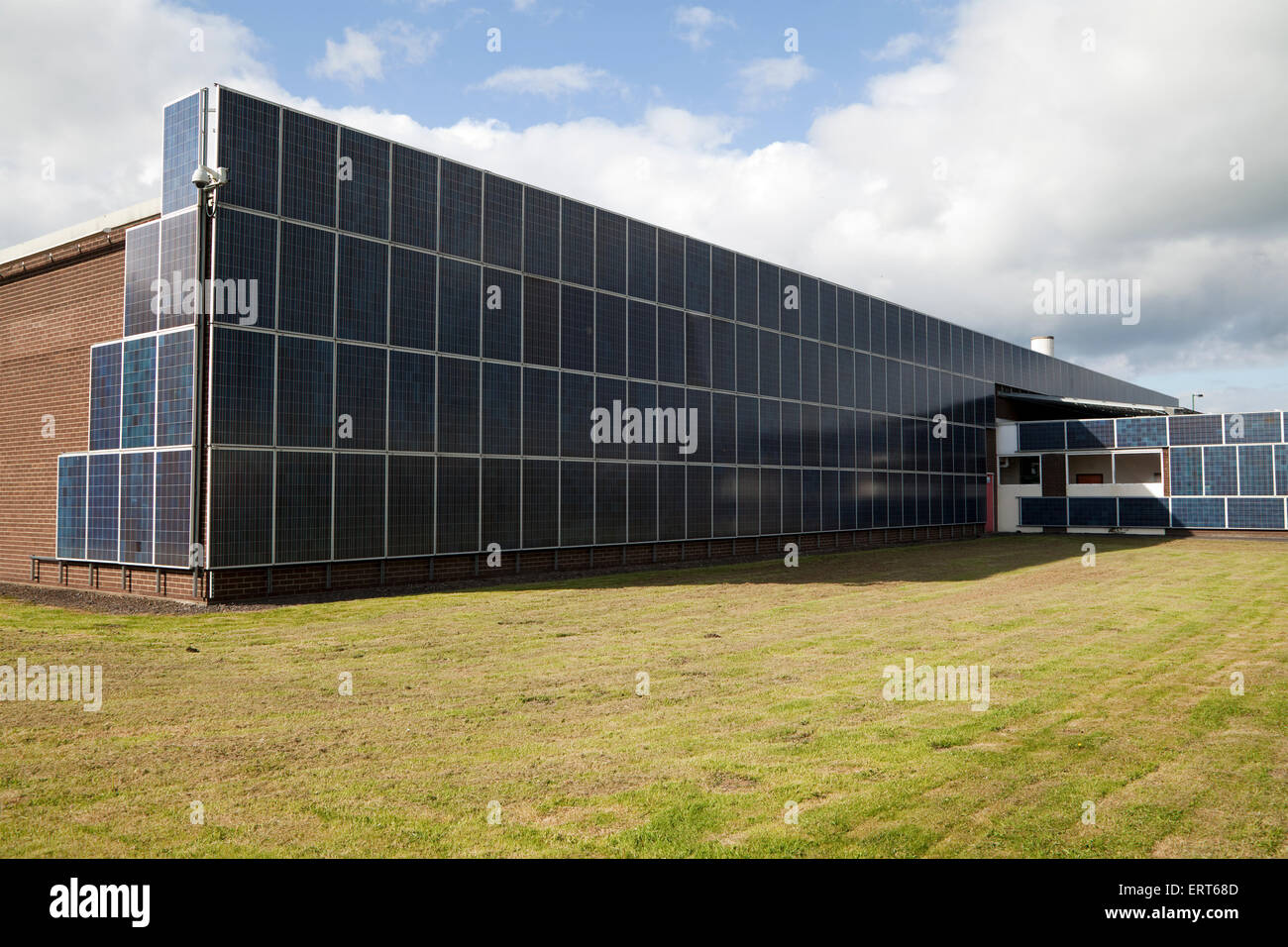 Office building encased in solar panels Stock Photo - Alamy