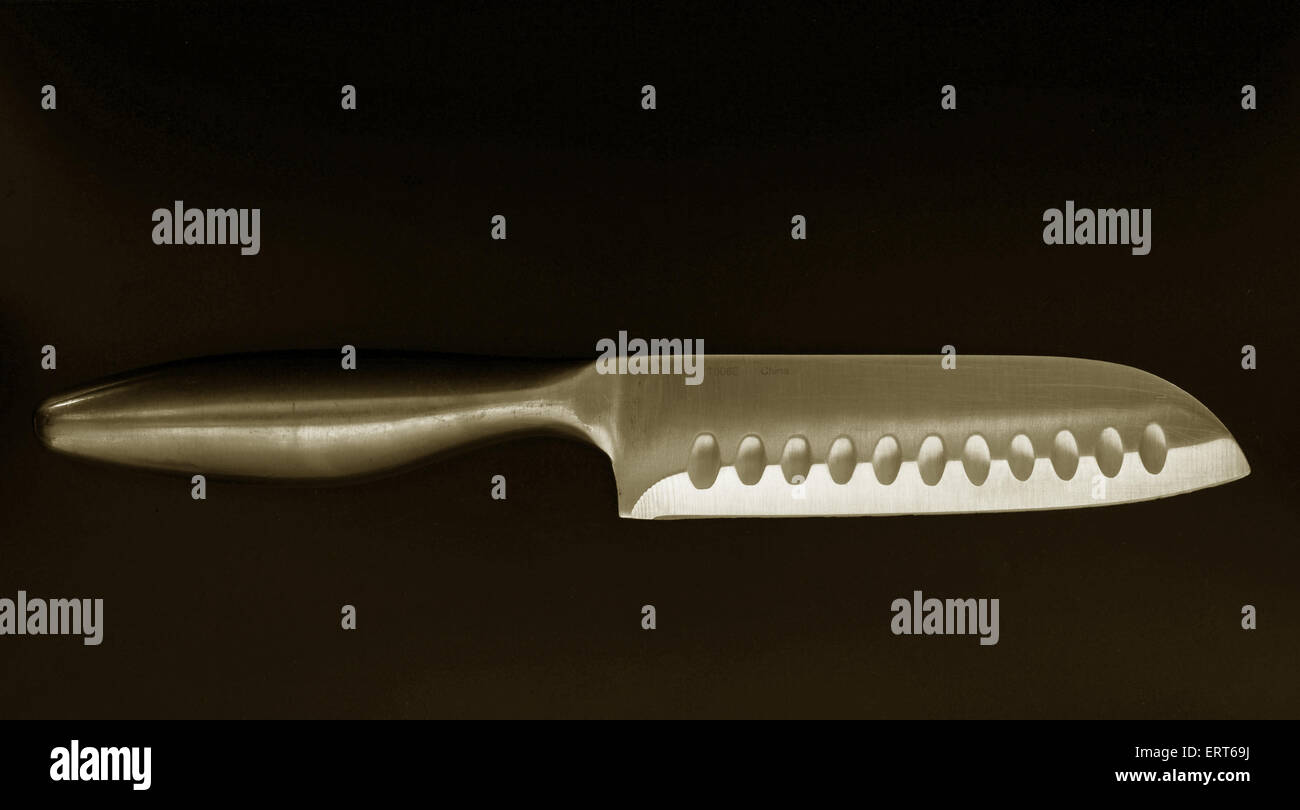 Sharp Kitchen Knife on Dark Background Stock Photo - Alamy