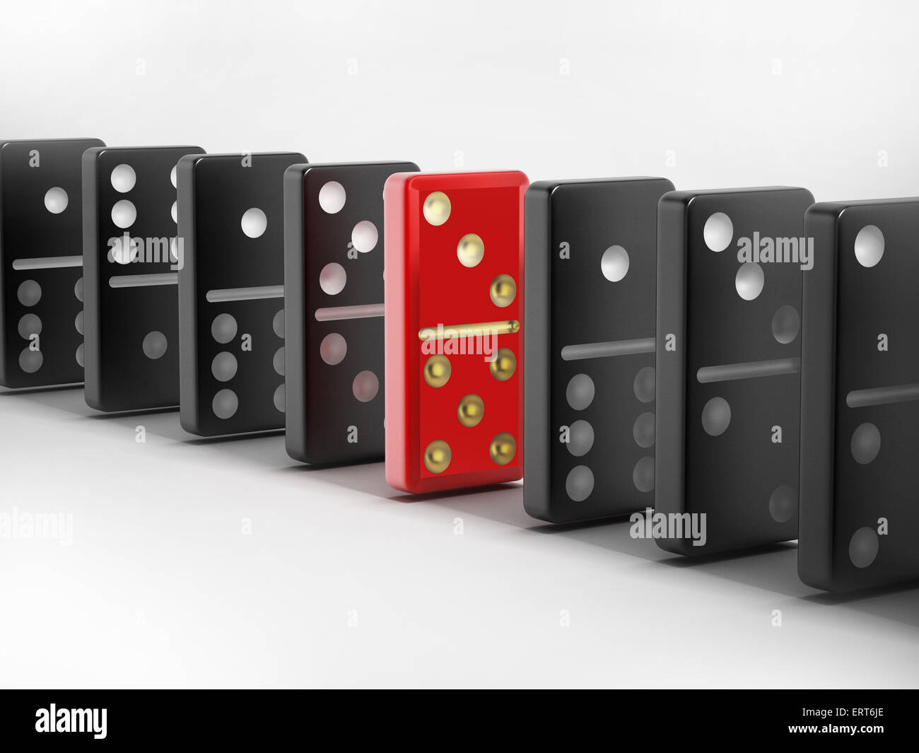 Red domino tile falling towards the black tiles isolated on white ...