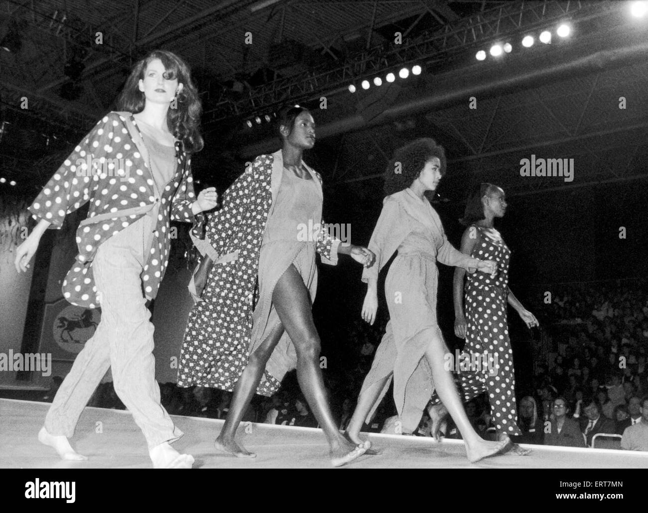 Clothes Show Live, models in spots and dresses slit to the waist stride ...