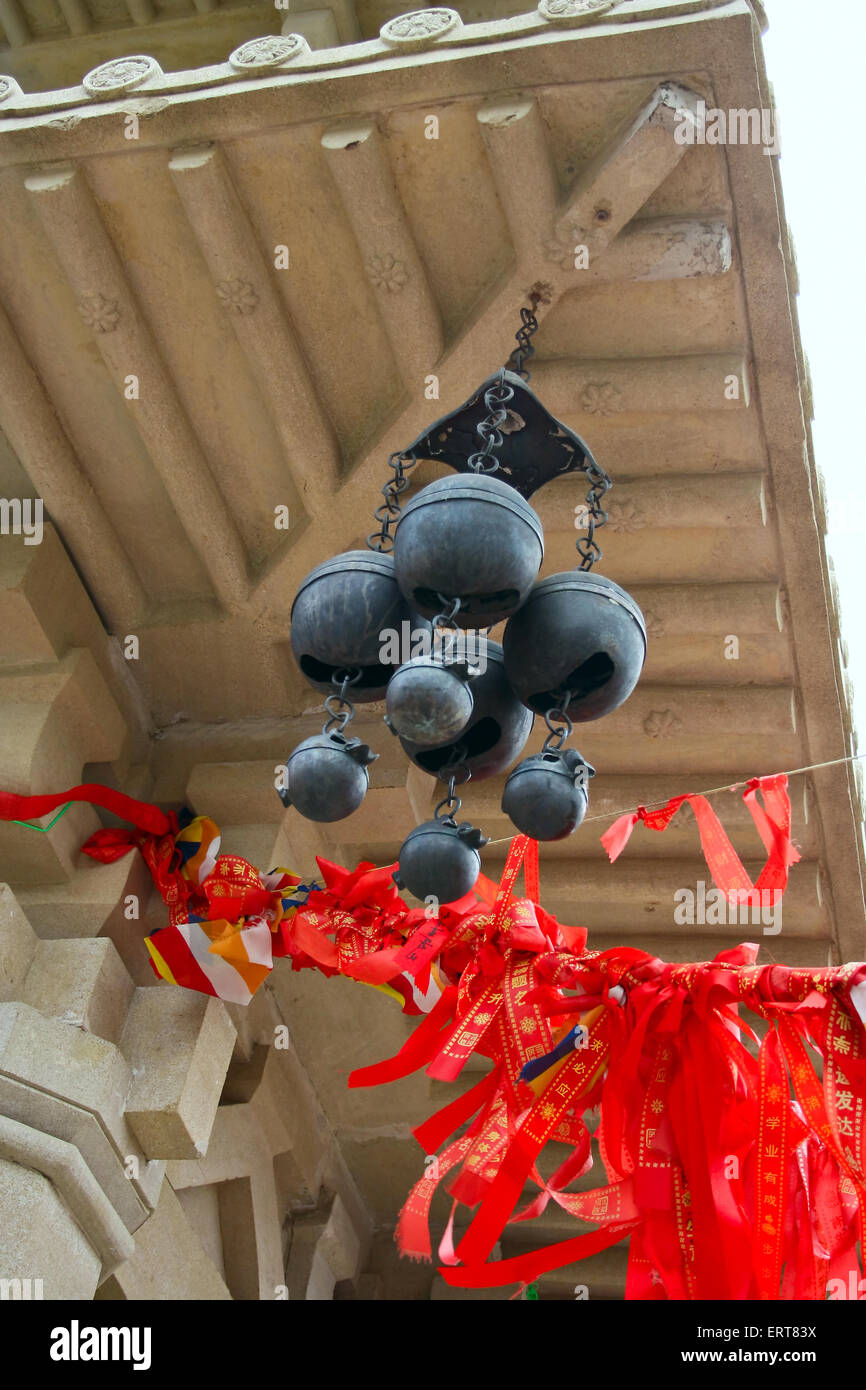funeral bells on the roof of the pagoda Stock Photo - Alamy