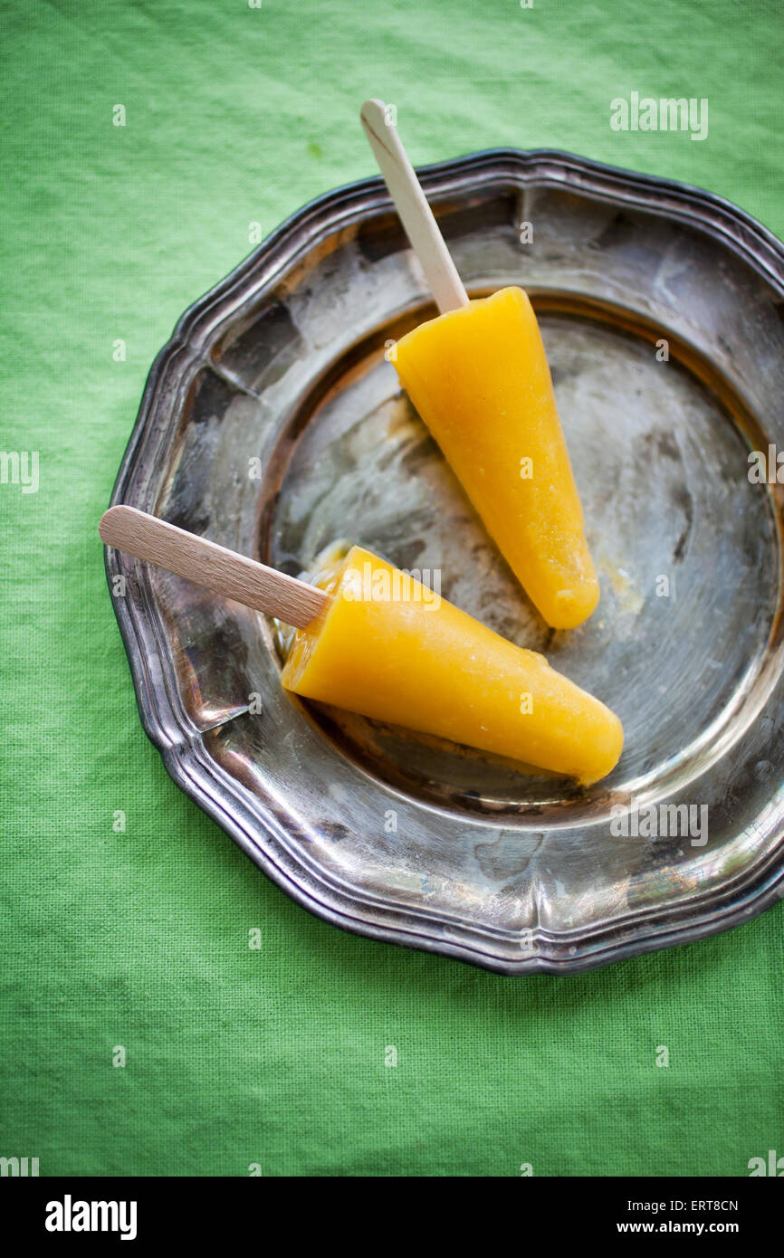 Frosty orange fruit popsicle hi-res stock photography and images - Alamy