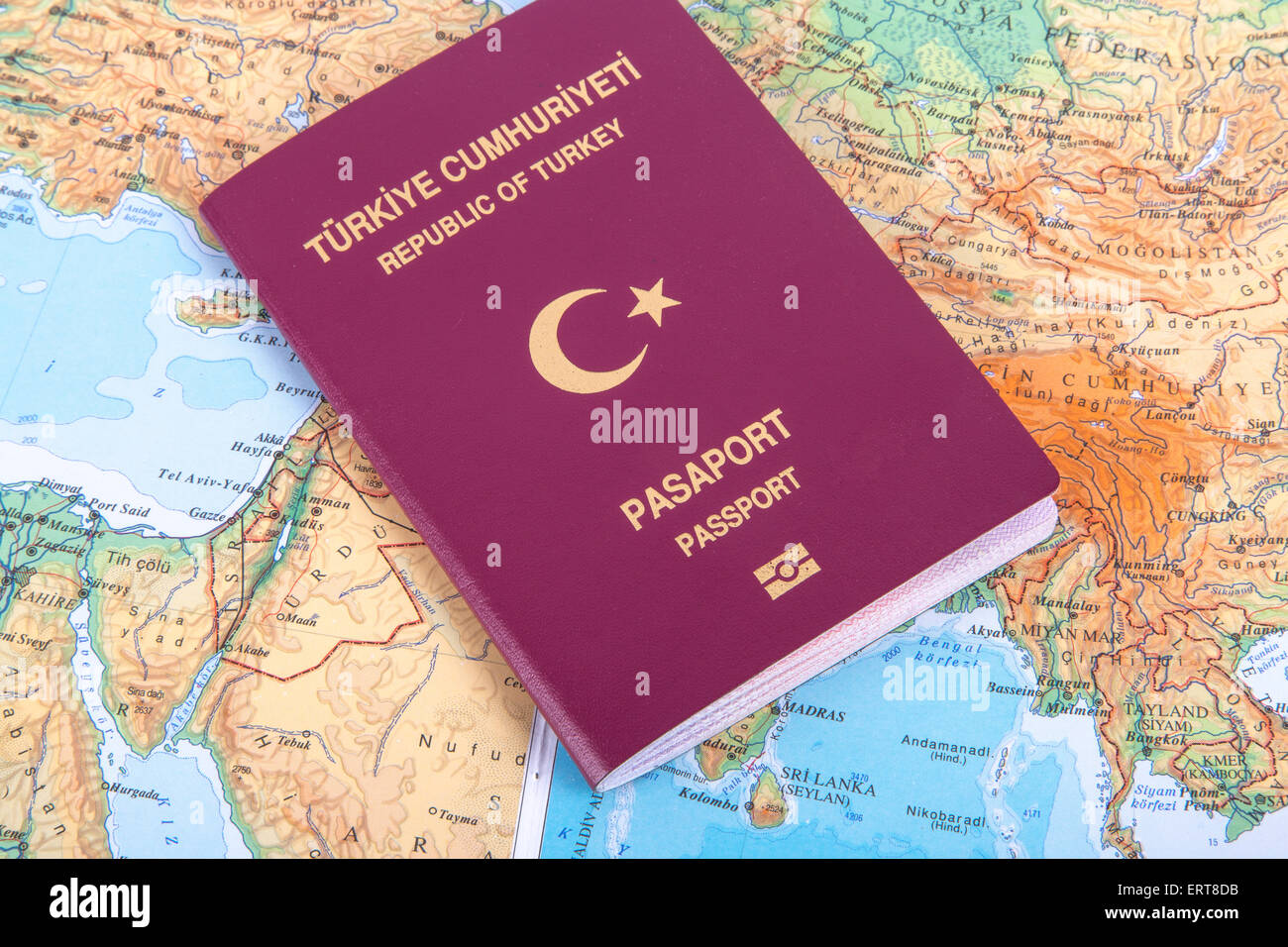 Close up detailed view of a Turkish passport lying on a world map Stock ...