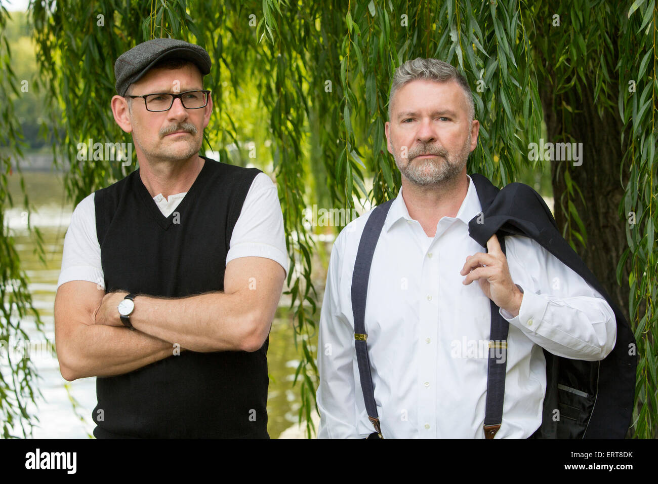 Two men standing together hi-res stock photography and images - Alamy
