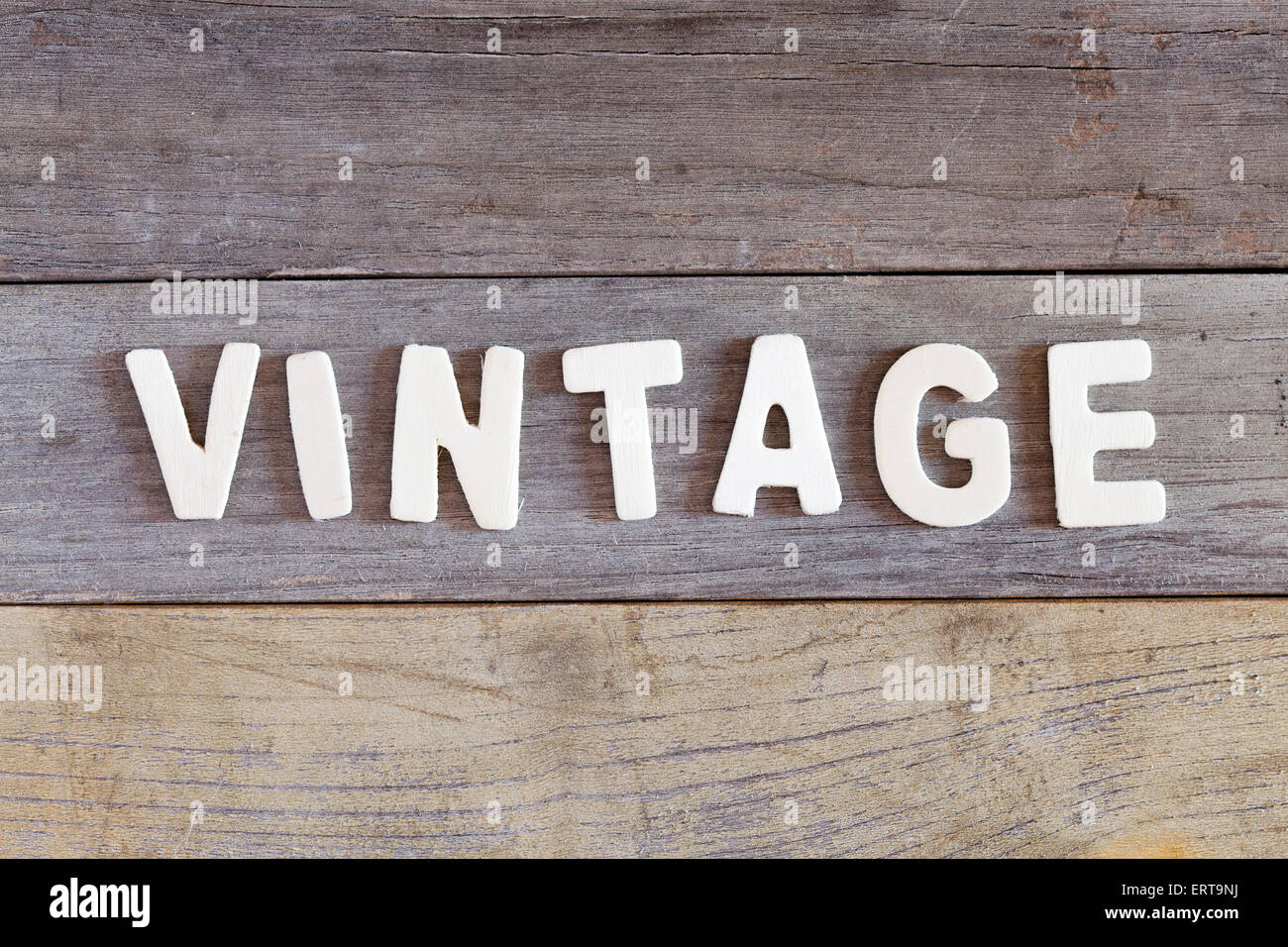 Word vintage written with wood letters over a wooden surface Stock ...