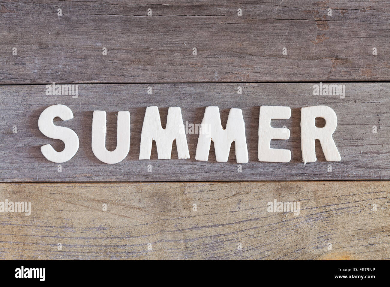Word summer written with wood letters over a wooden surface Stock Photo ...