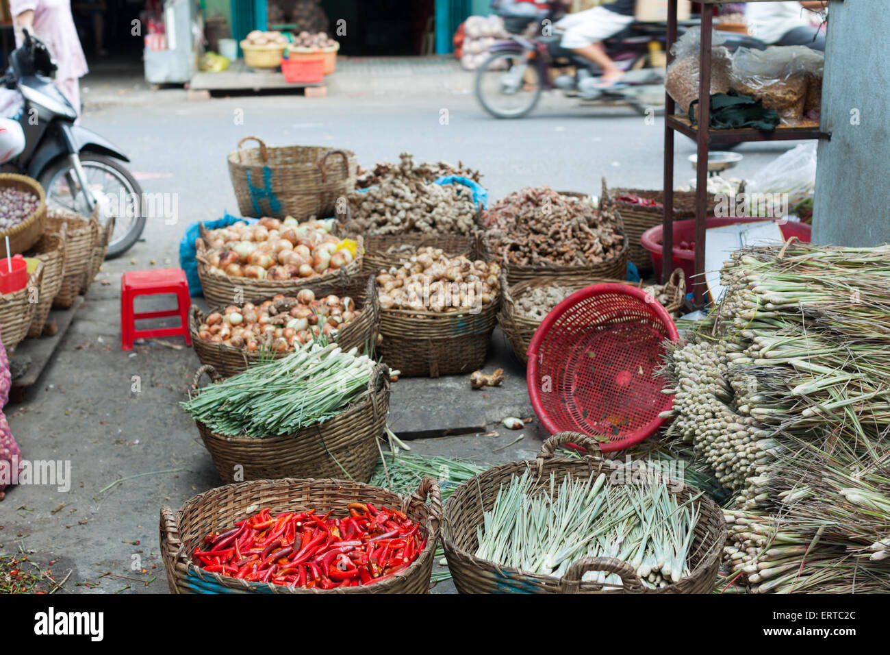 asian street market basket red chilly pepper greens Stock Photo - Alamy
