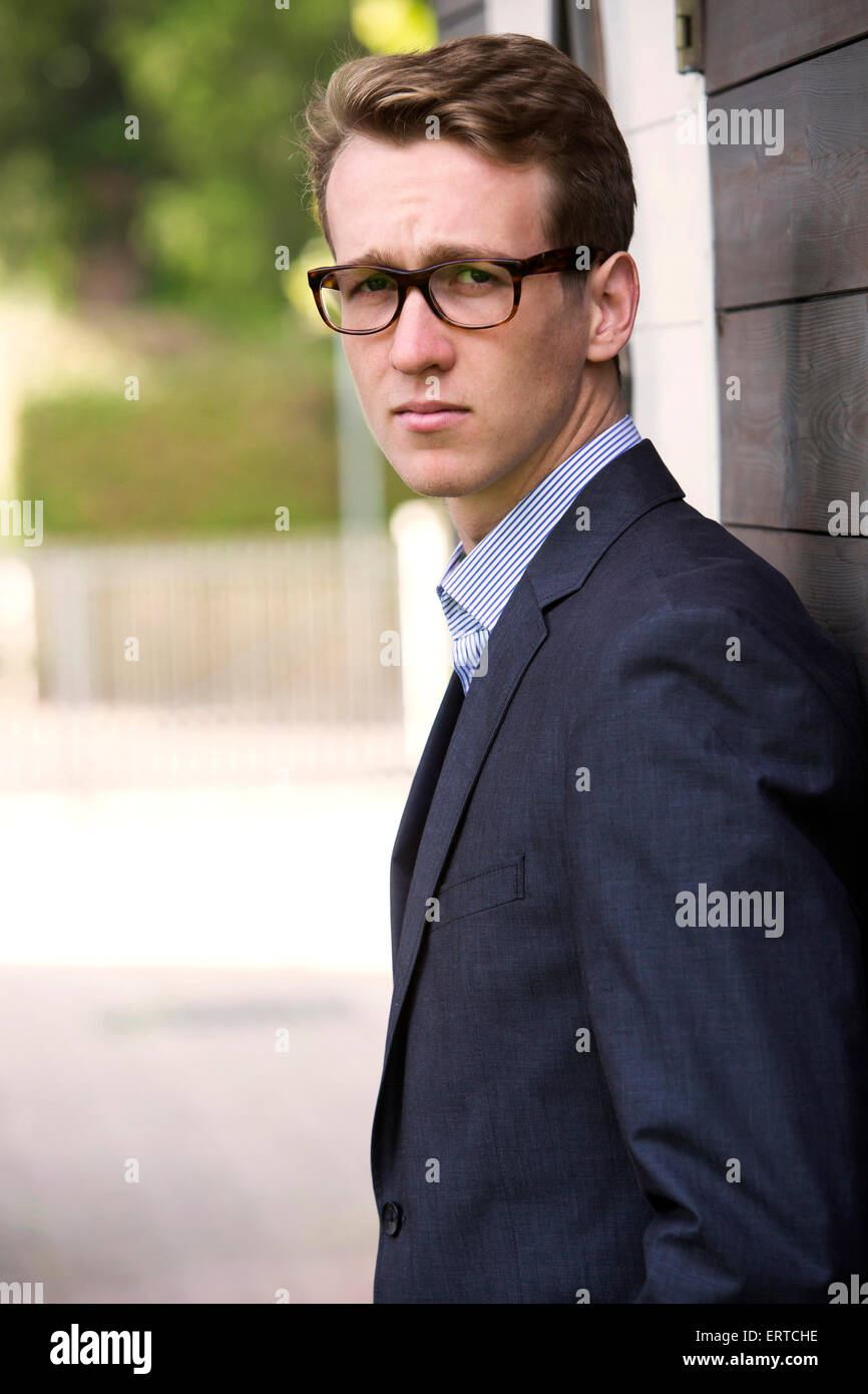 Young salesman in suit hi-res stock photography and images - Alamy