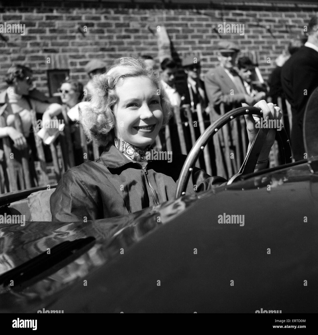 Racing at Goodwood, Carol Fisher, one of the drivers in the ladies race ...