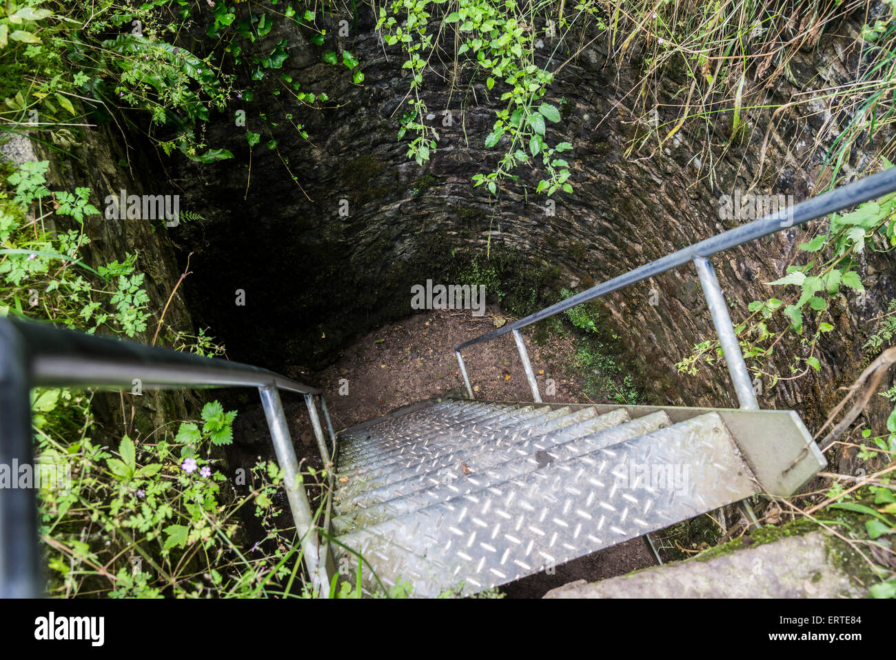 Metal stairs/step leading down into pit Stock Photo - Alamy
