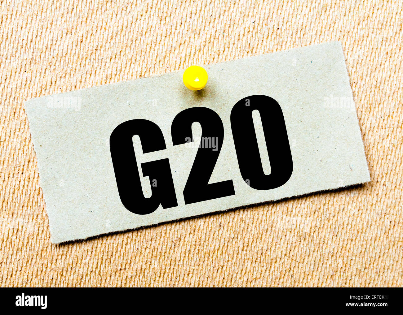 Recycled paper note pinned on cork board with words G20. Concept Image ...