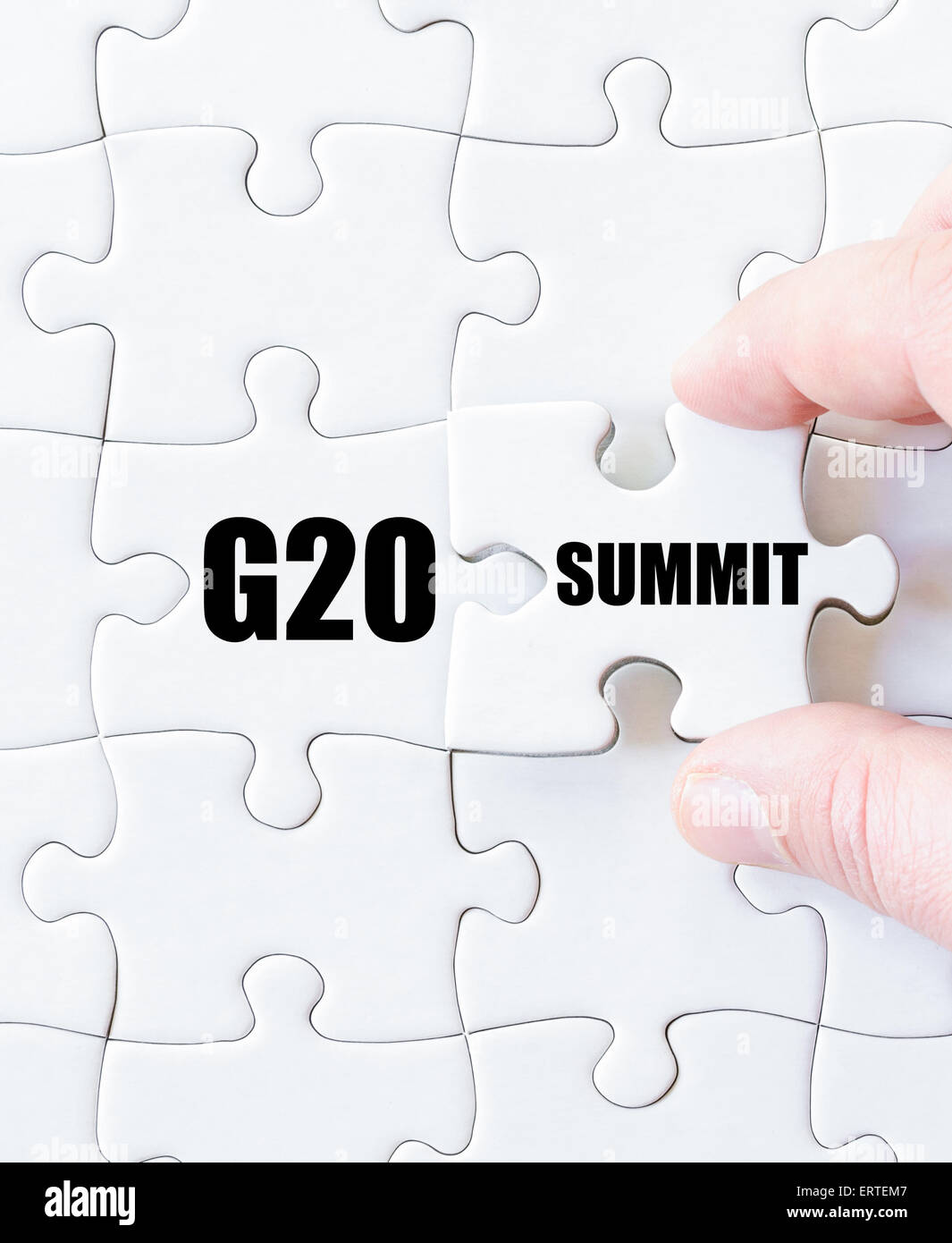 Last puzzle piece with word G20 SUMMIT. Concept image Stock Photo - Alamy