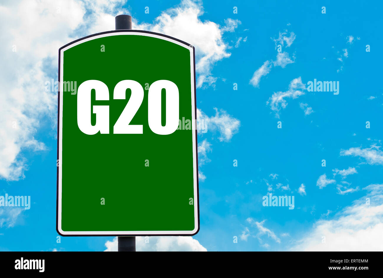 G20 SUMMIT written on green road sign against clear blue sky background ...