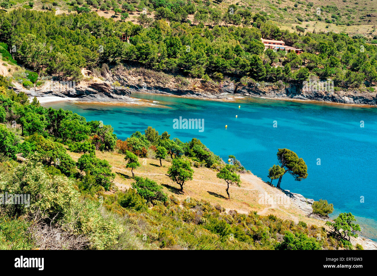 a view of a peaceful cave in the Costa Brava, Catalonia, Spain, with a ...