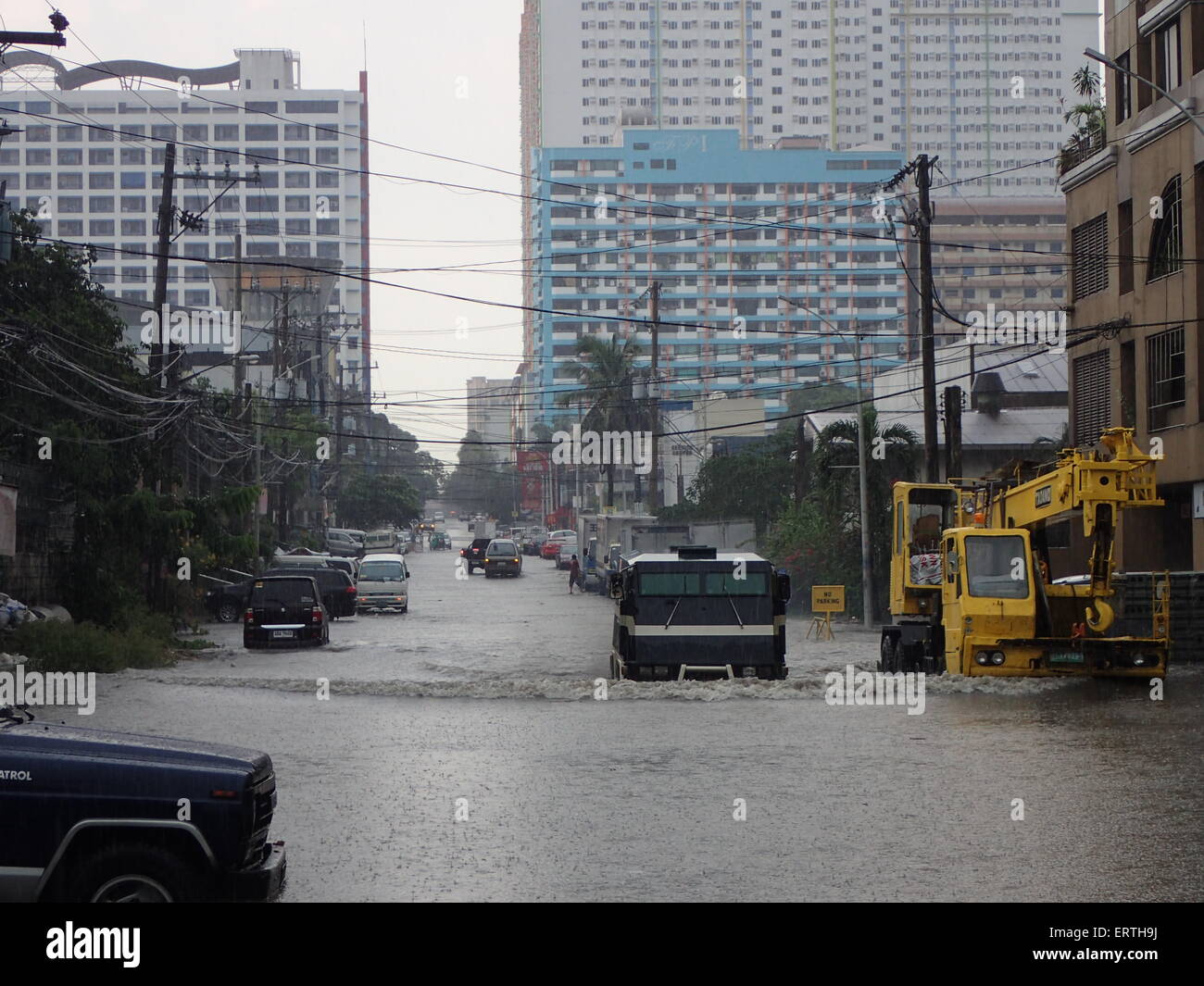 Quezon City, Philippines. 08th June, 2015. Vehicles passing through the ...