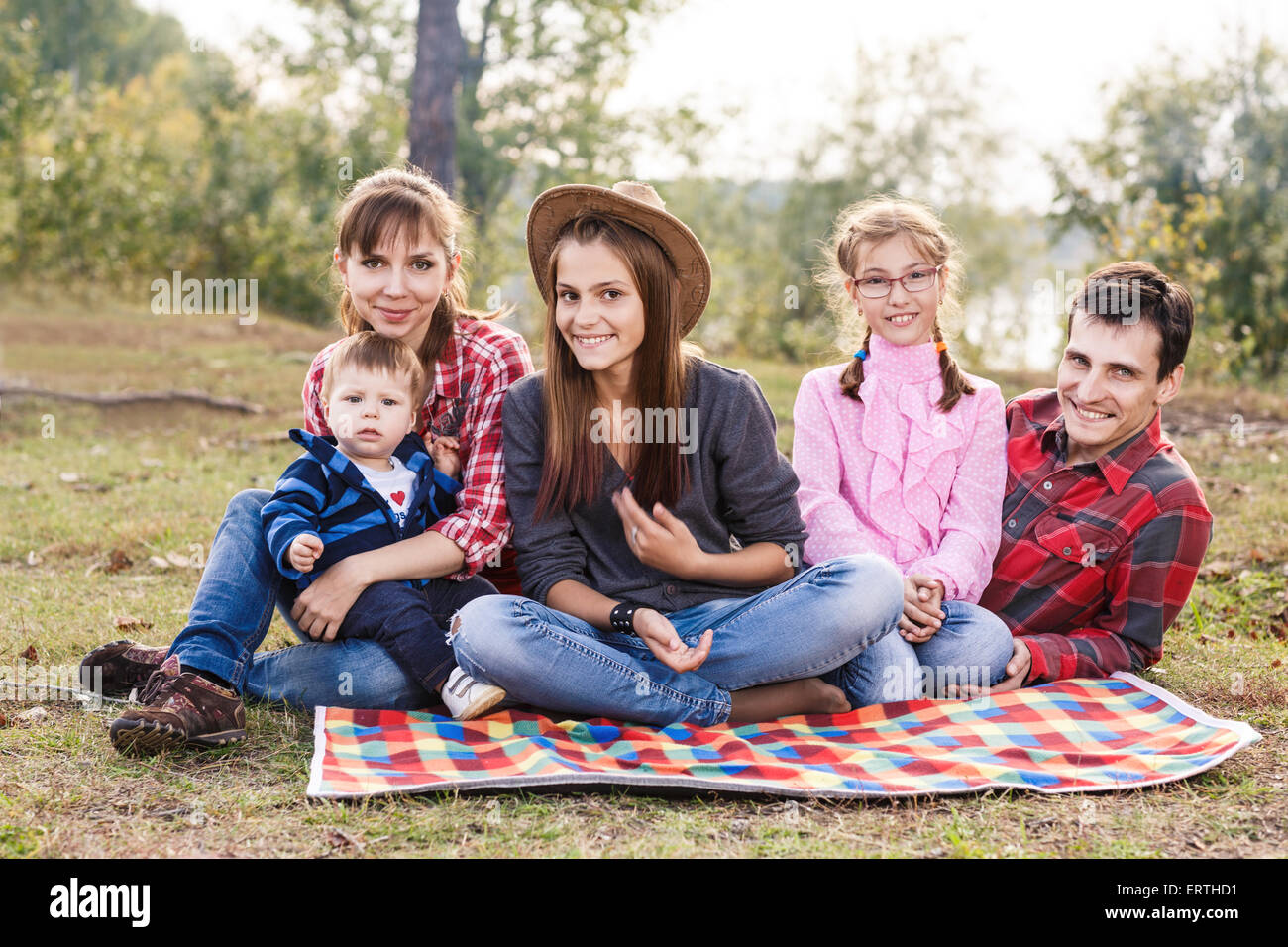 Happy family outdoors Stock Photo - Alamy
