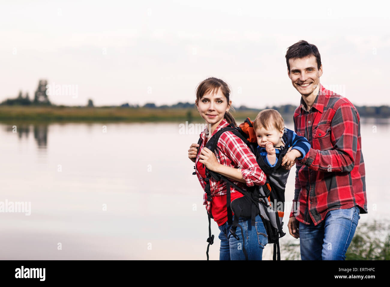 Happy family outdoors Stock Photo - Alamy