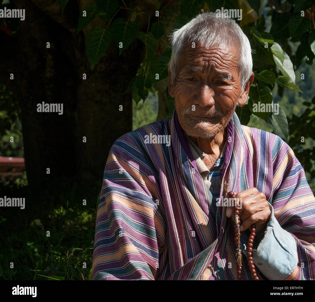 An older Bhutanese gentleman holds his prayer beads Stock Photo - Alamy An older Bhutanese gentleman holds his prayer beads Stock Photo - Alamy