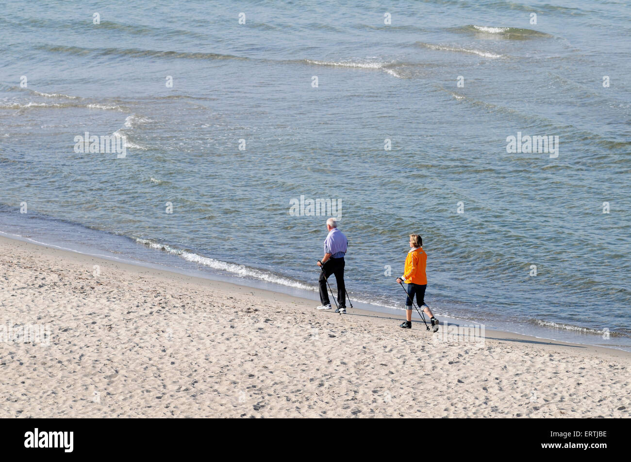 Nordic Walking Couple at the baltic sea Germany Stock Photo - Alamy