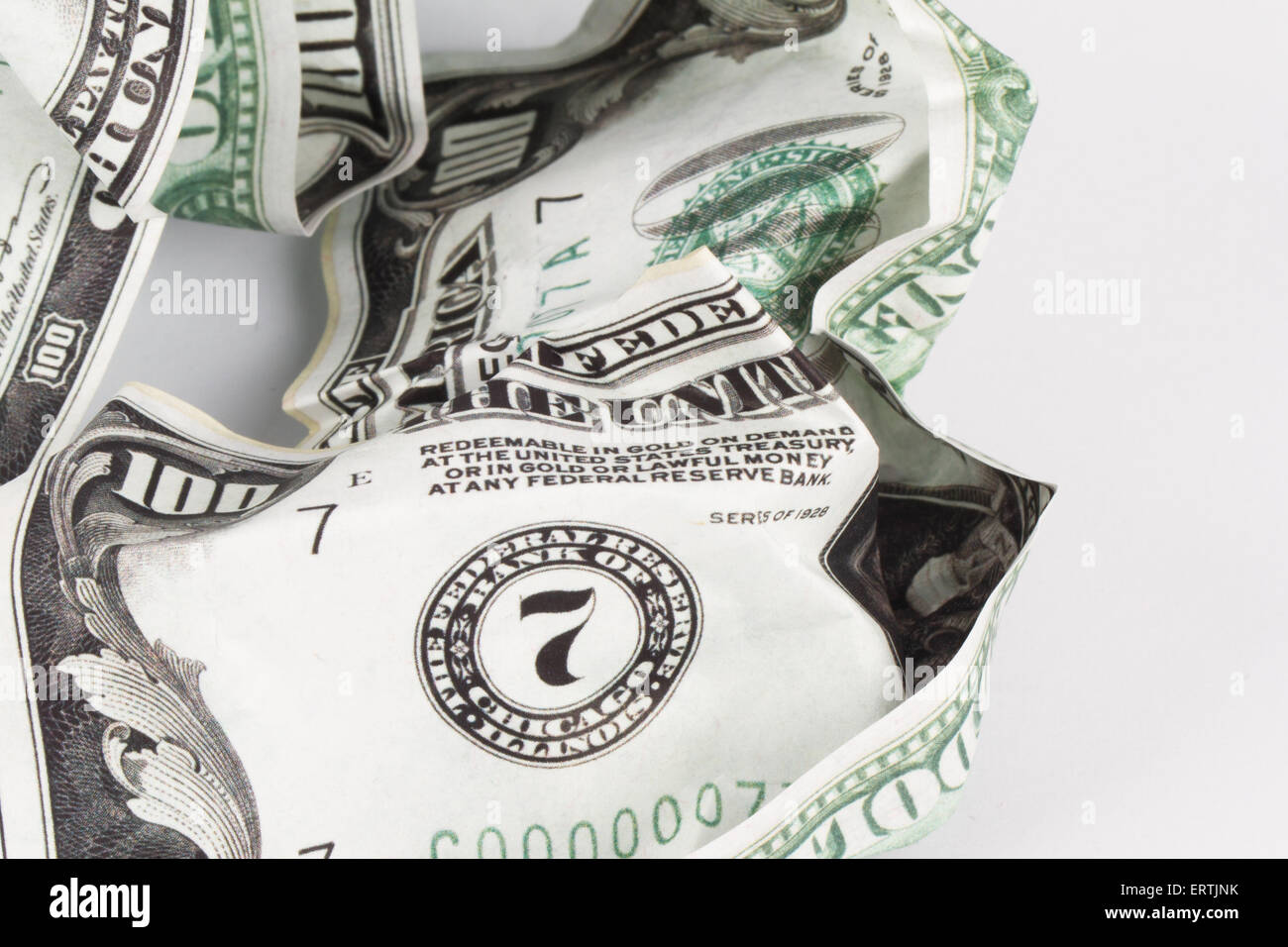 Close up detailed top view of crumpled one hundred dollar bannotes ...