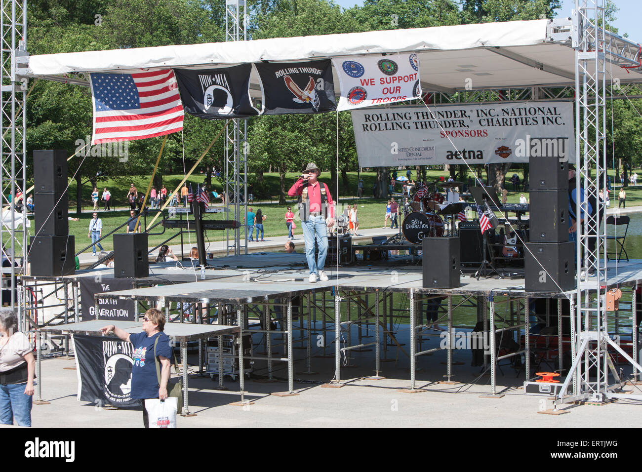 A speaker talks to the crowd prior to the Rolling Thunder Ride for ...