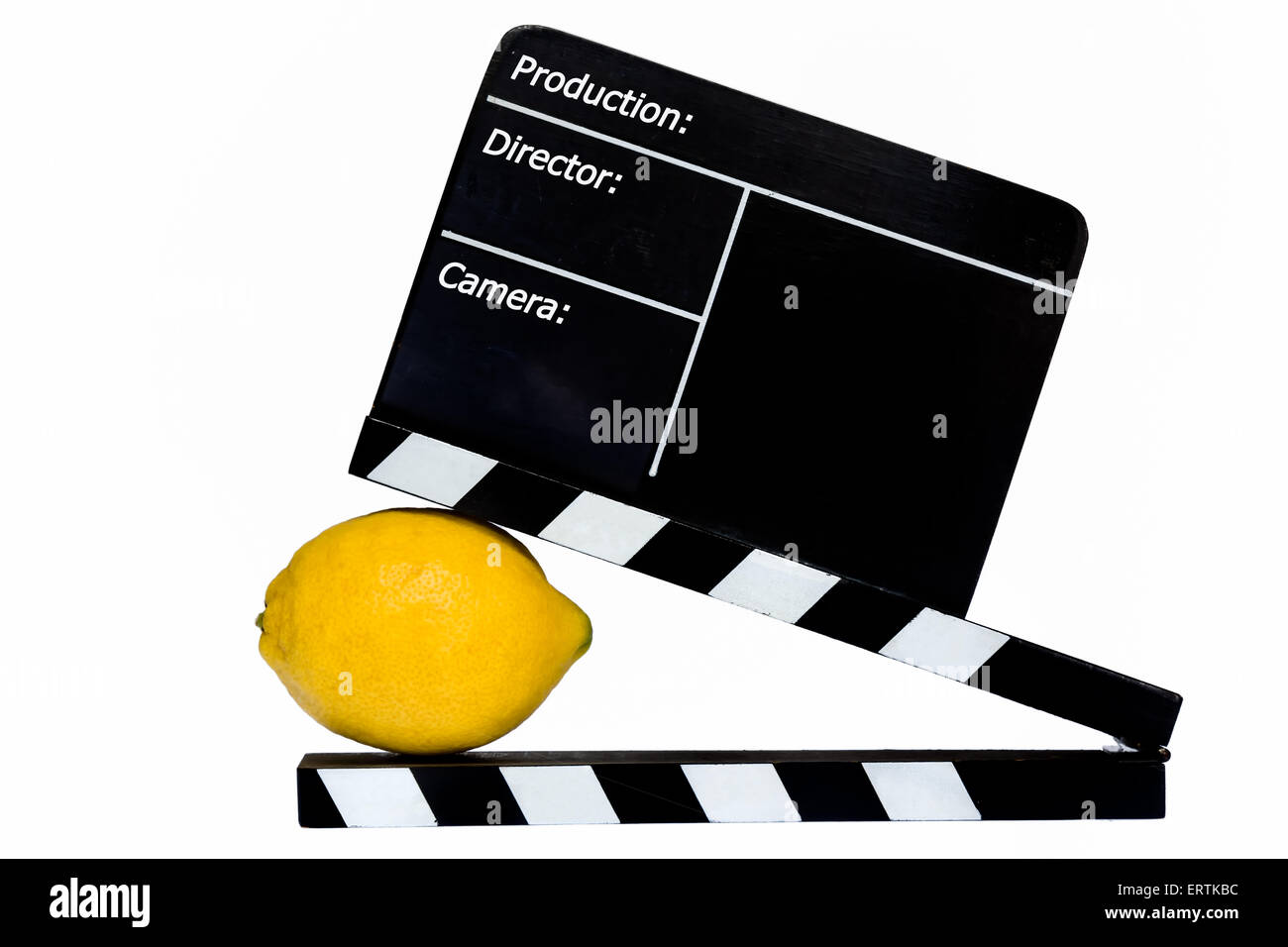 Lemon Story - Lemon and film flap on stage Stock Photo - Alamy