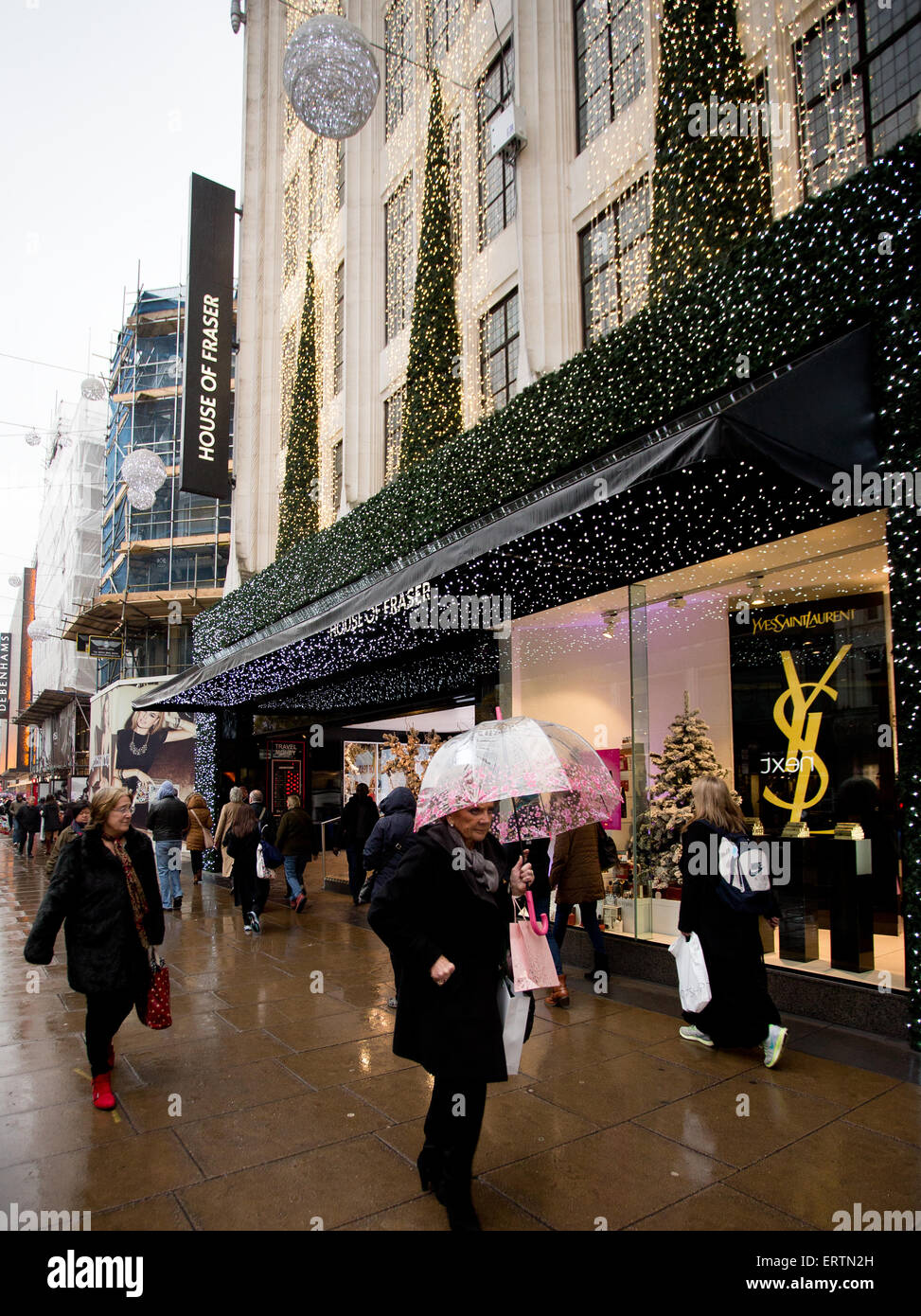 Shoppers brave the dismal weather to visit the shops in London's West ...