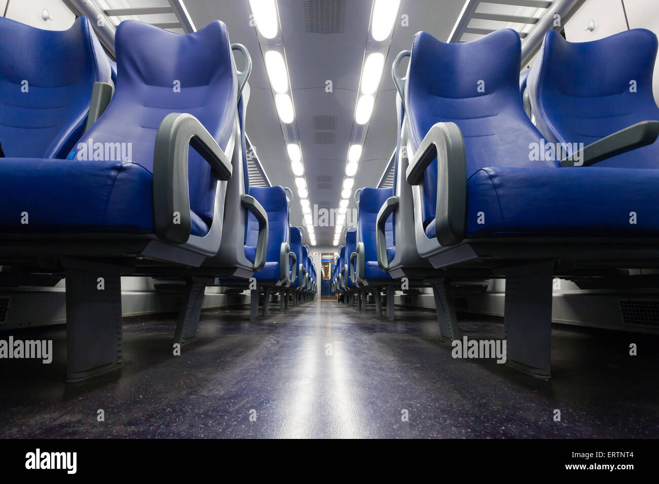 Perspective view of seats from the aisle inside a passenger train Stock ...