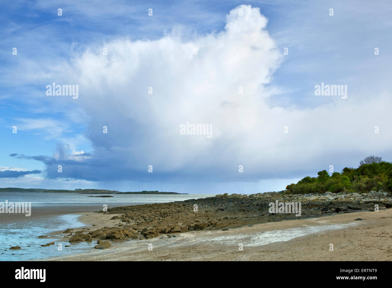 A shower cloud over the beach at Mossyard on Fleet Bay near Gatehouse ...