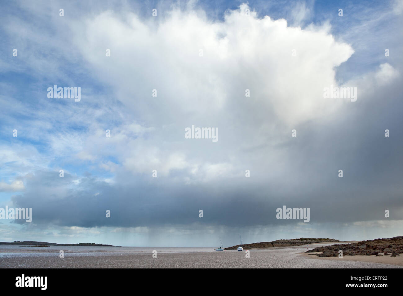 A shower cloud over the beach at Mossyard on Fleet Bay near Gatehouse ...
