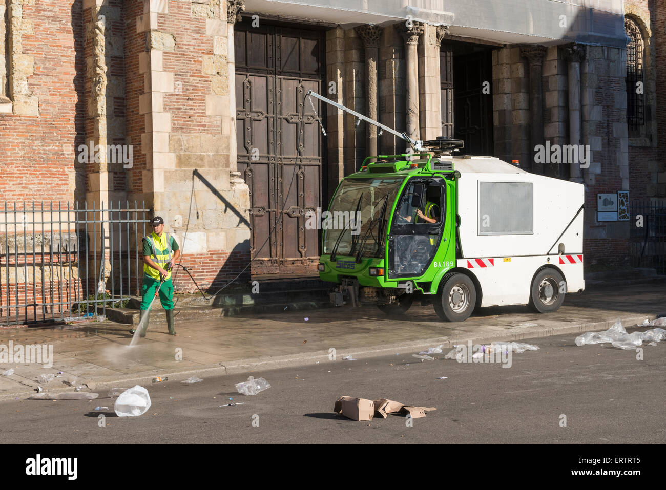 People cleaning street hi-res stock photography and images - Alamy