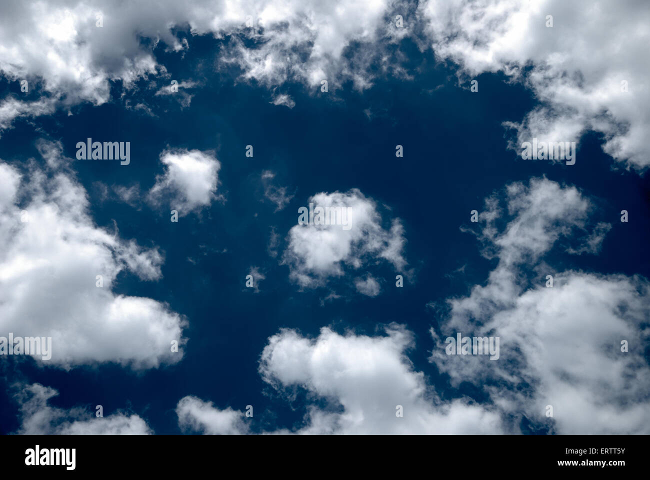 Shiny clouds in the dramatic sky in midday Stock Photo - Alamy