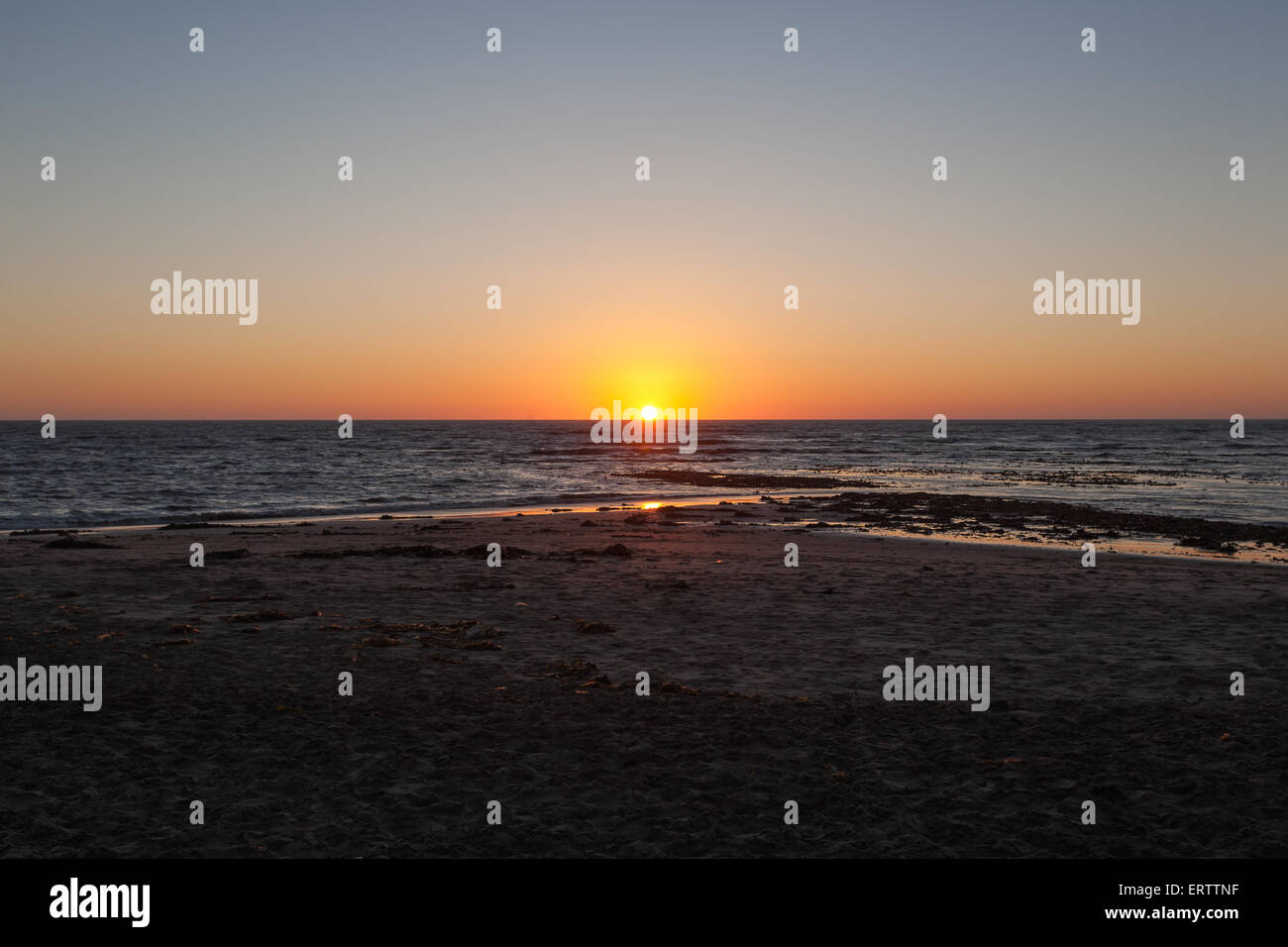 Namibian sunset at Swakopmund beach Stock Photo - Alamy