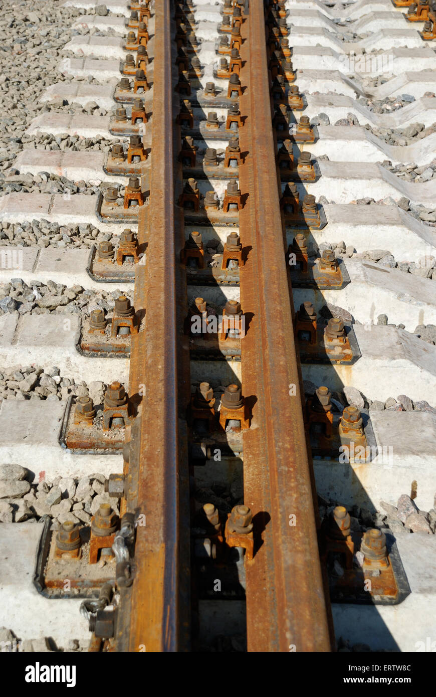 Close up of connection a rail and railway cross ties Stock Photo - Alamy
