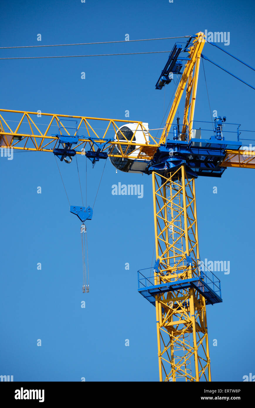 The silhouette of new blue construction crane Stock Photo - Alamy