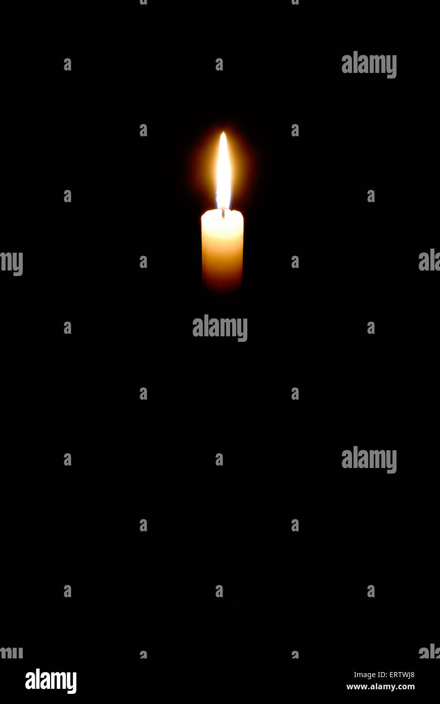 The burning candle disappears in the distance on black Stock Photo - Alamy